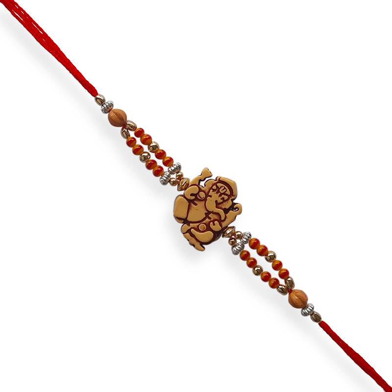 Double Layered Ganesh Rakhi with Yellow Beads - Send Gifts and Money to ...